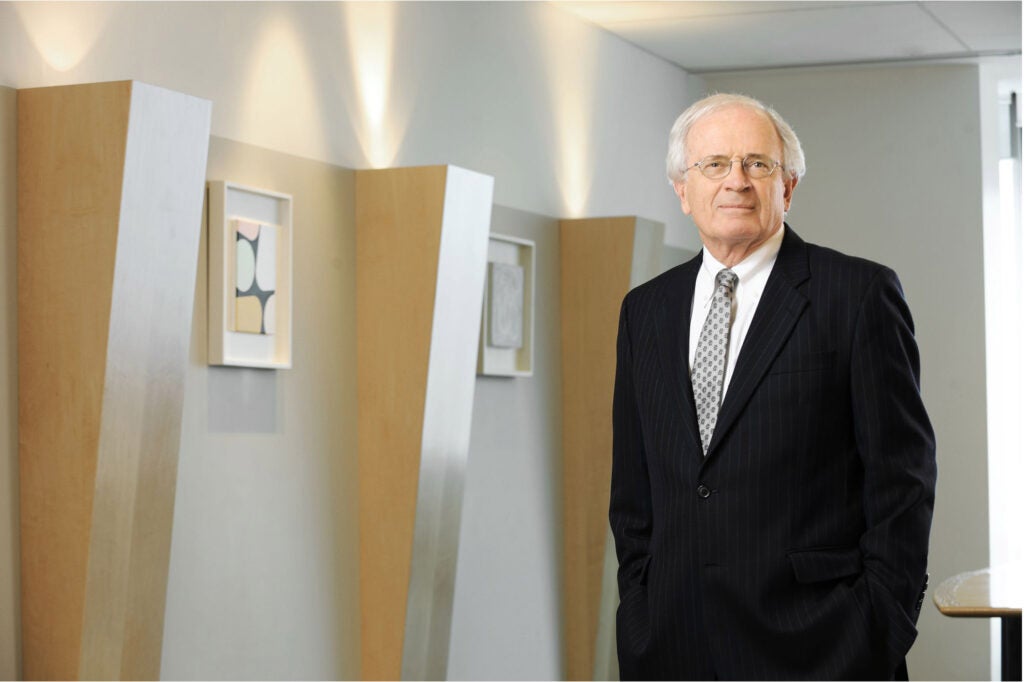 A renowned international arbitrator, New Zealand attorney Sir David ...